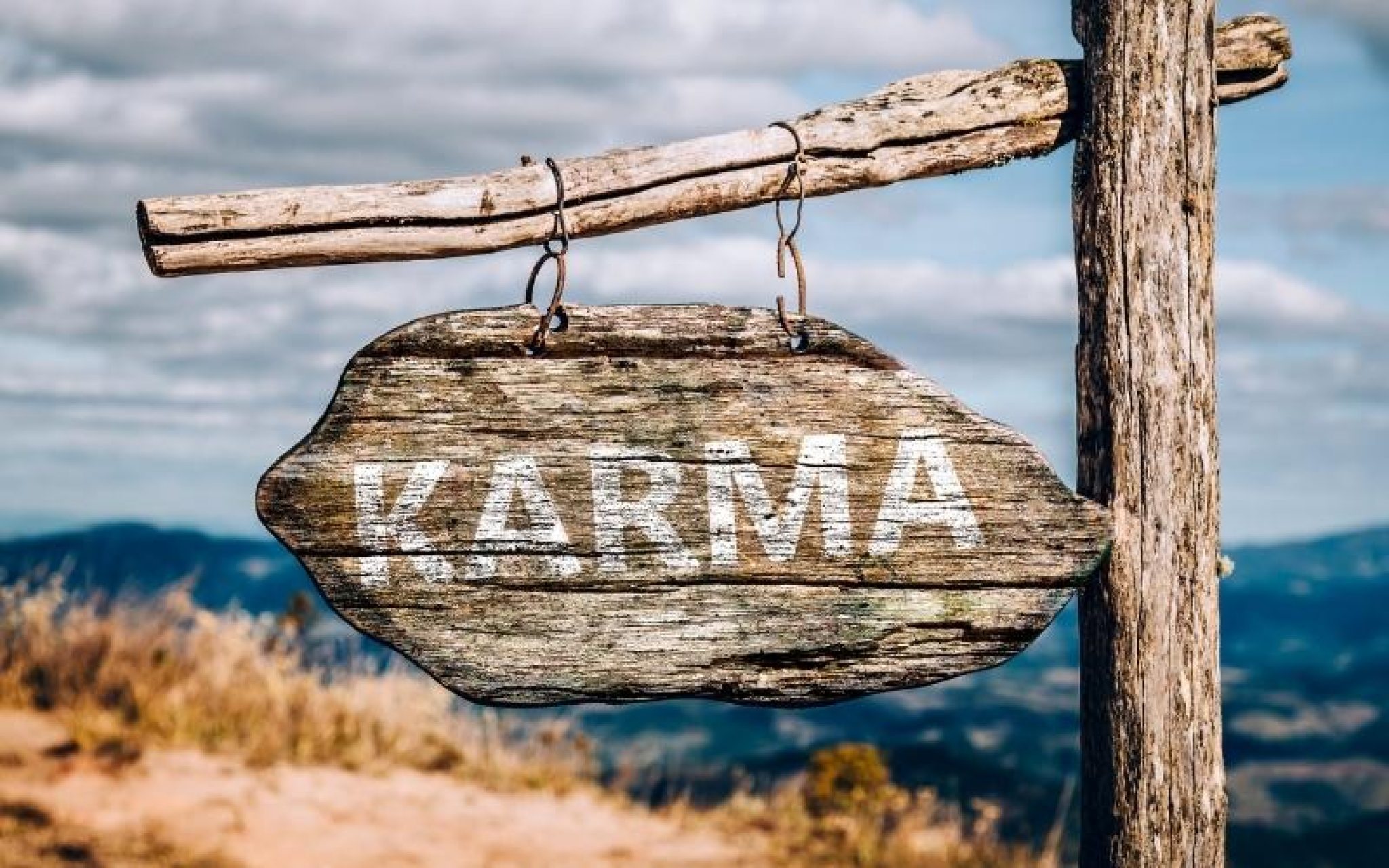 6 Signs You Have A Karmic Debt And How To Clear It For Good